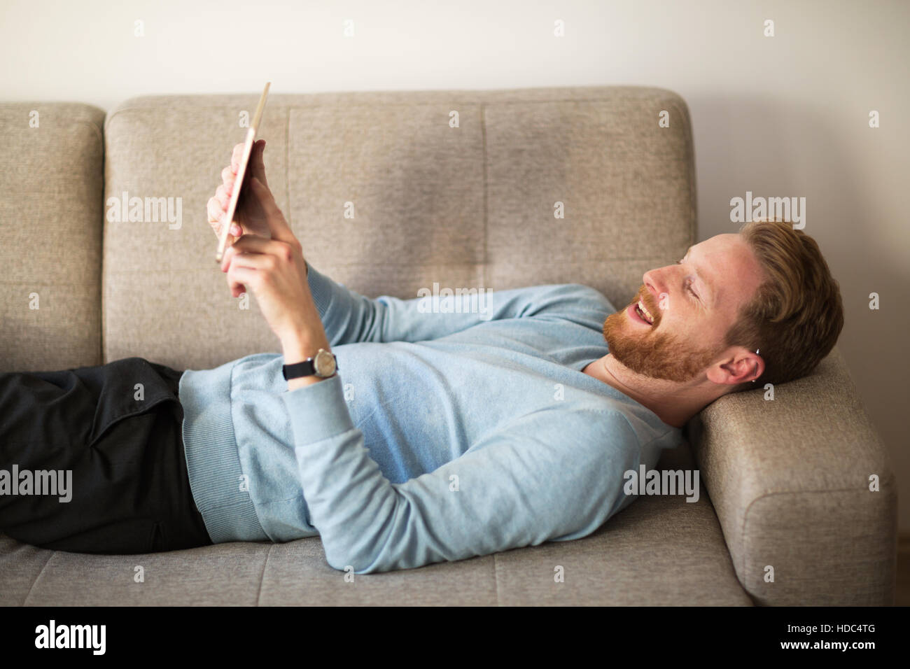 Sofa surfing hi-res stock photography and images - Alamy