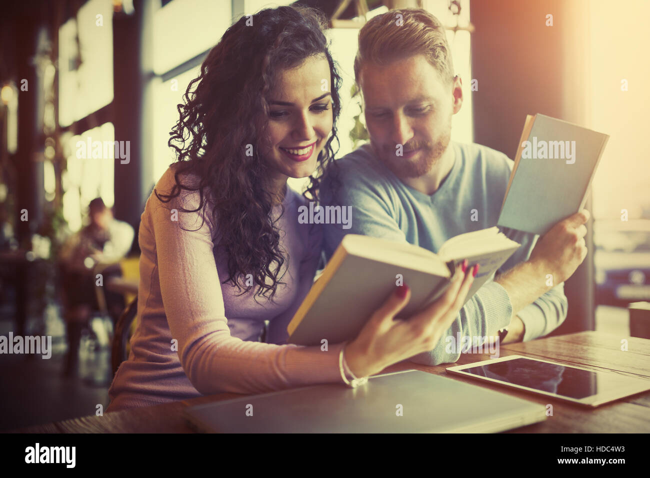 University students reading books hi-res stock photography and images ...