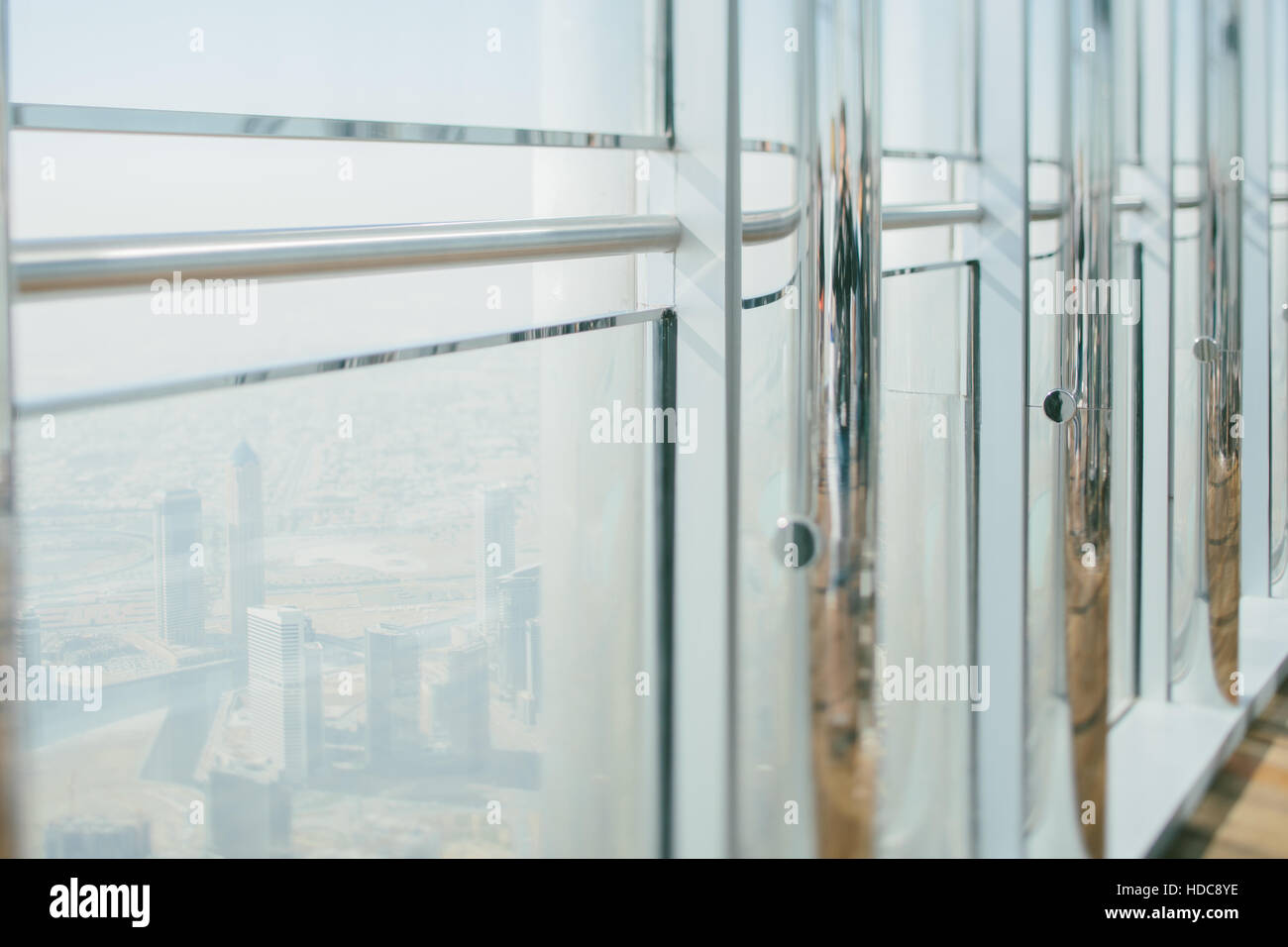 Tilt shift shooting, chrome columns, view from skyscraper through the ...