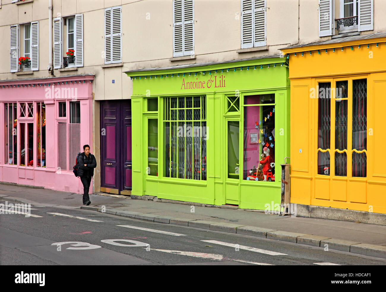 Colorful shops right next to the canal Saint-Martin, Paris, France ...