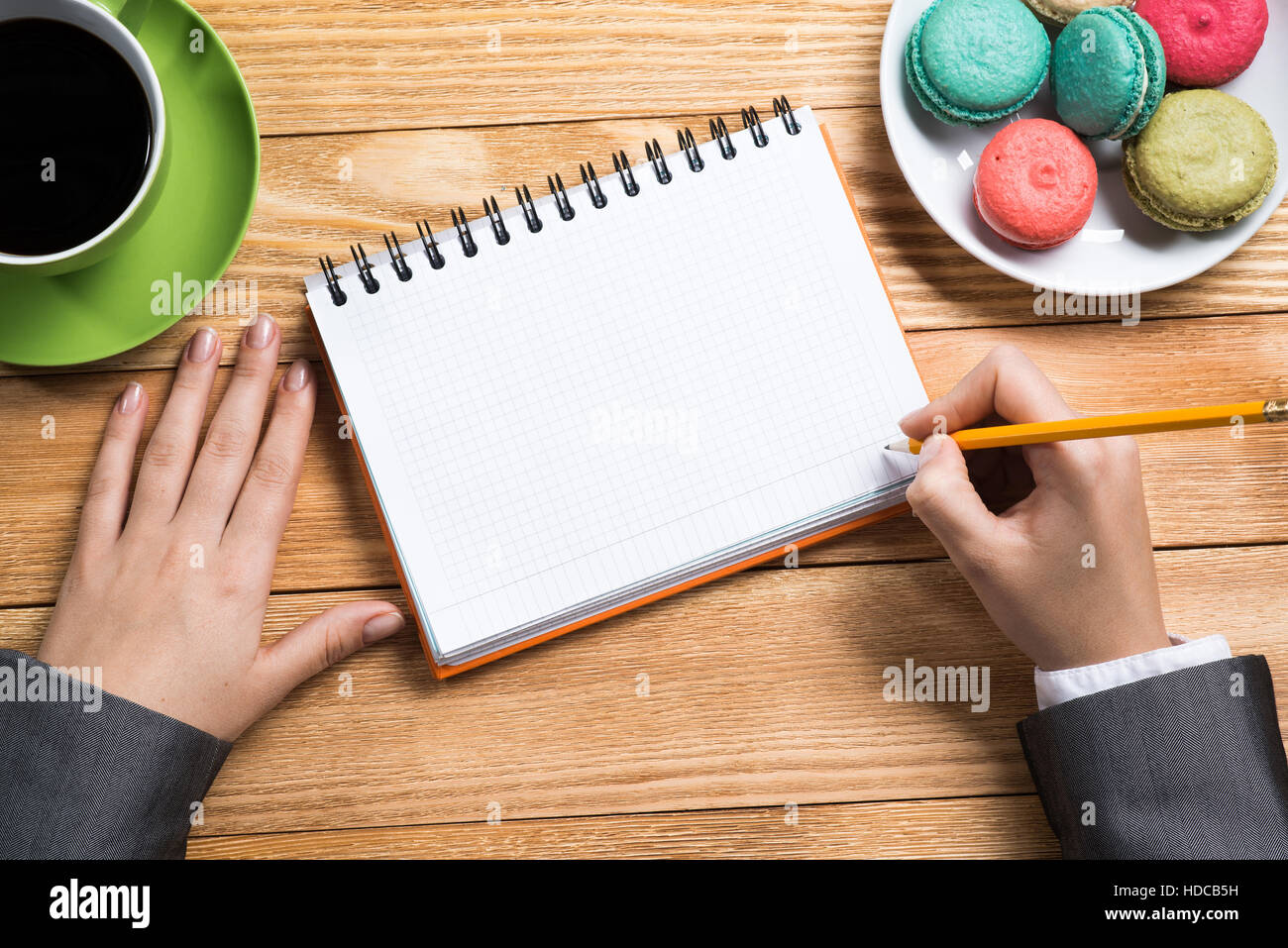 Businesswoman making some notes Stock Photo - Alamy