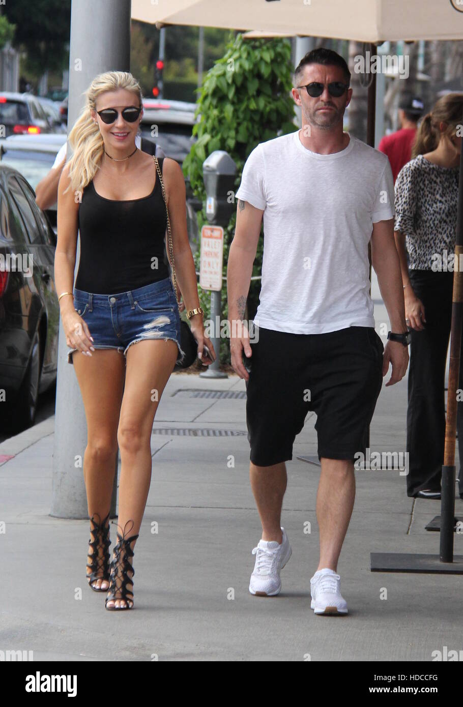 Robbie Keane and his wife Claudine Palmer leaving Il Pastaio in Beverly ...
