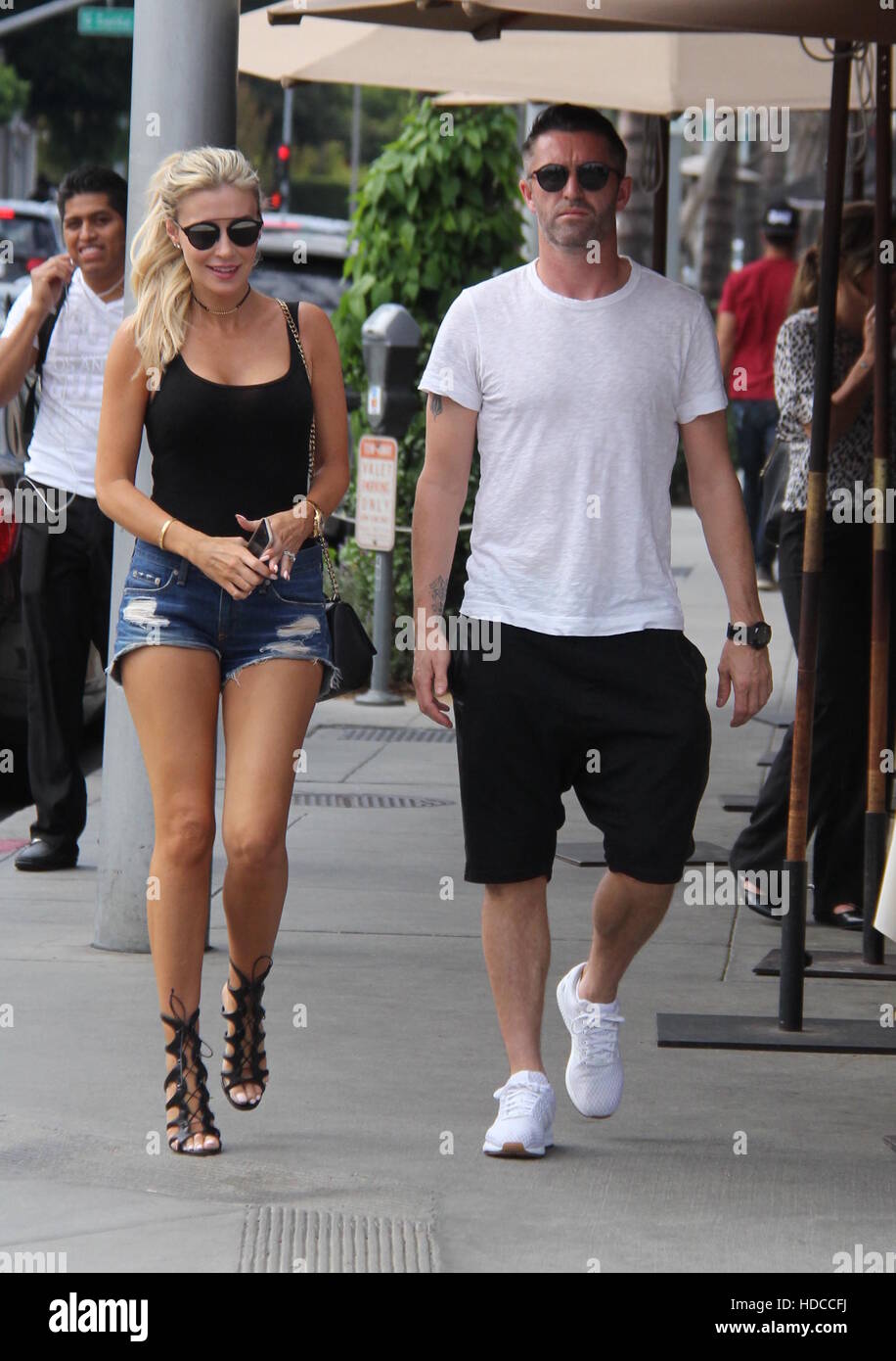 Robbie Keane and his wife Claudine Palmer leaving Il Pastaio in Beverly ...