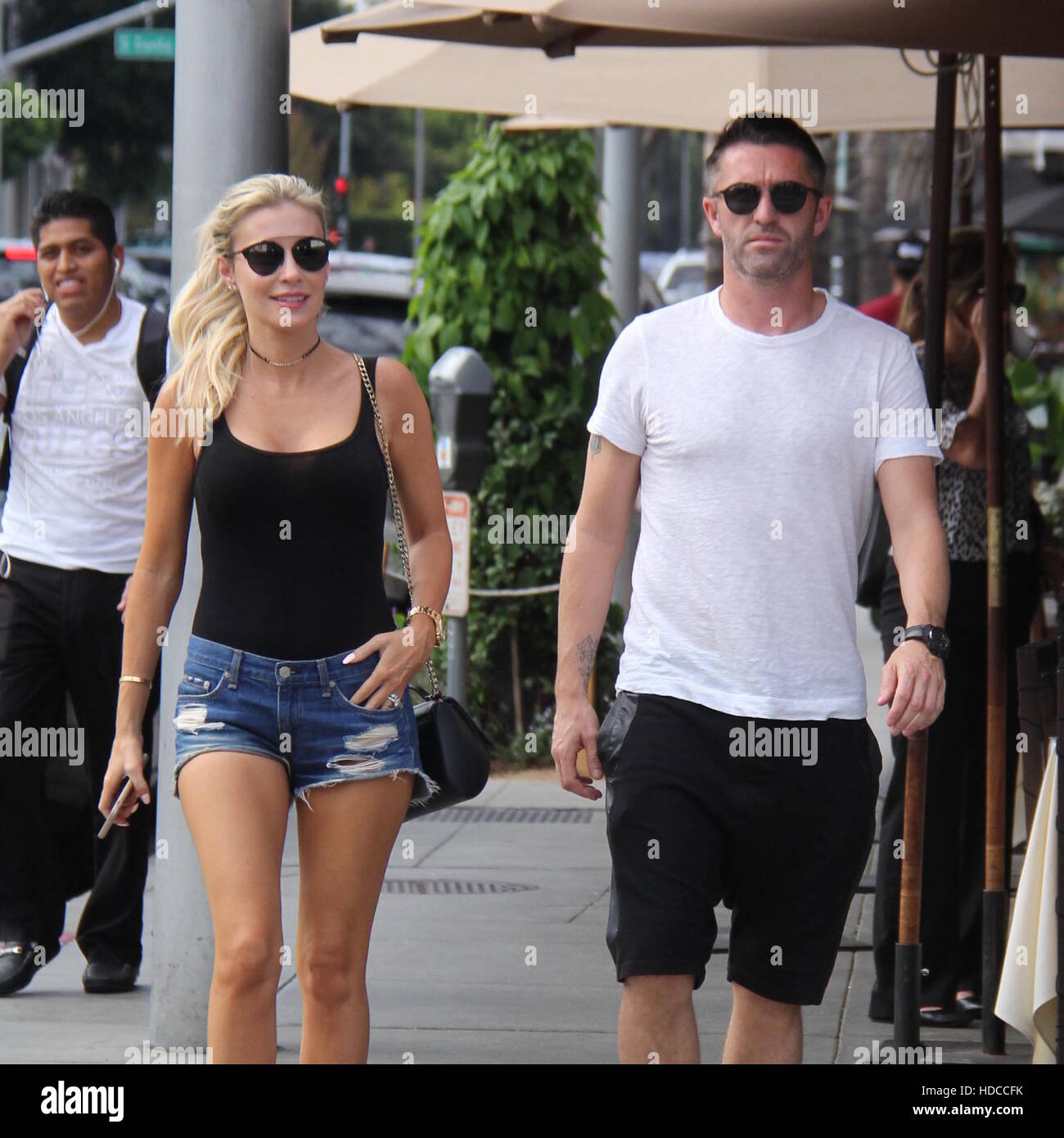 Robbie Keane and his wife Claudine Palmer leaving Il Pastaio in Beverly ...