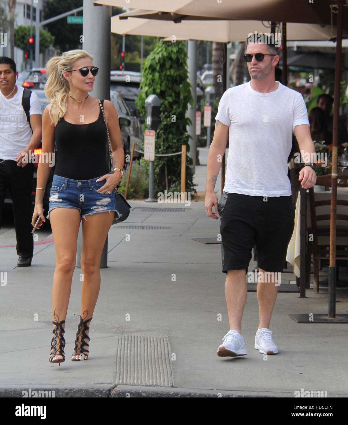 Robbie Keane and his wife Claudine Palmer leaving Il Pastaio in Beverly ...