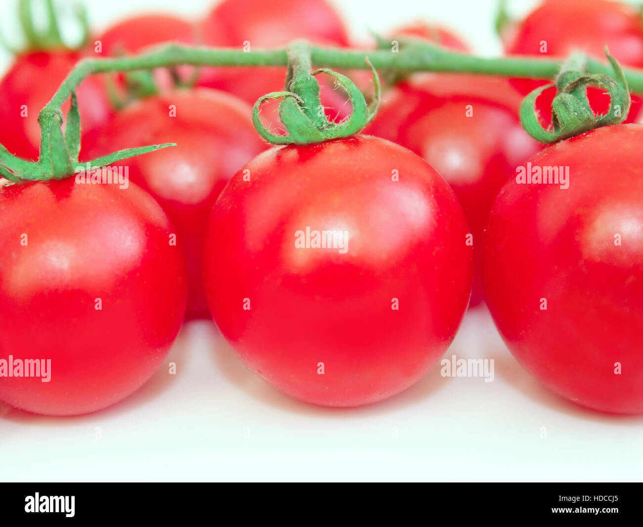 fresh red juicy tomatoes isolated on the white Stock Photo - Alamy