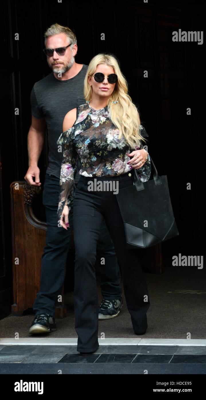 Jessica Simpson and her husband leaving a hotel Featuring: Jessica ...
