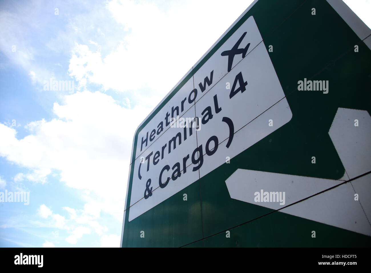 Aircrafts taking off and landing at Heathrow Airport Featuring: Signage ...
