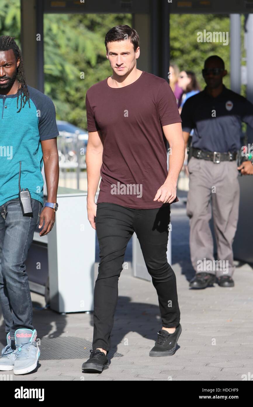 Ryan Lochte and Cheryl Burke seen at Universal studios where they were ...