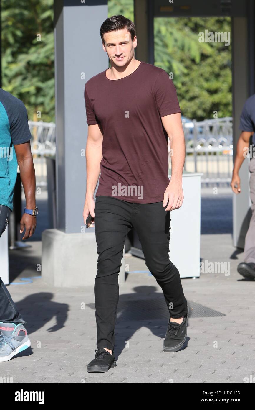 Ryan Lochte and Cheryl Burke seen at Universal studios where they were ...