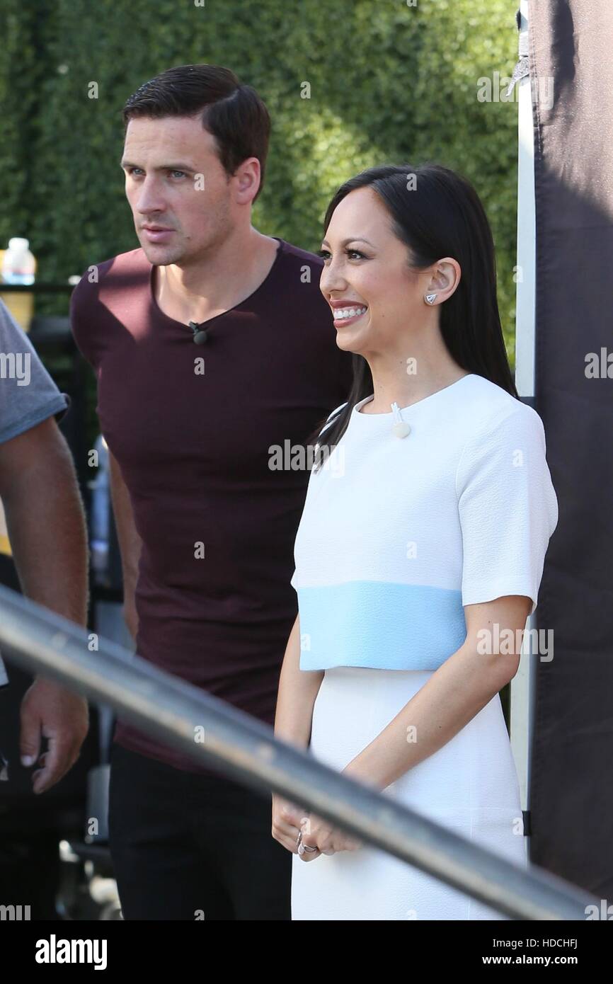 Ryan Lochte and Cheryl Burke seen at Universal studios where they were ...