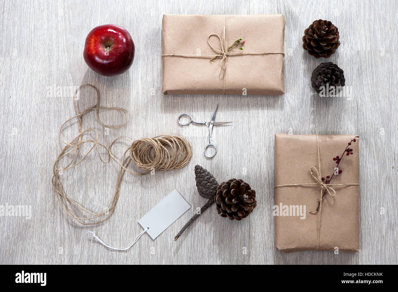 Various items for gift wrapping are on the table. Gifts already packed ...