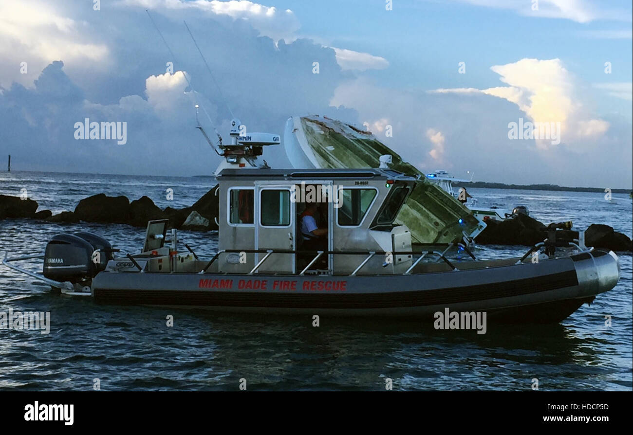 A view of overturned boat that was spotted on a jetty near Government ...
