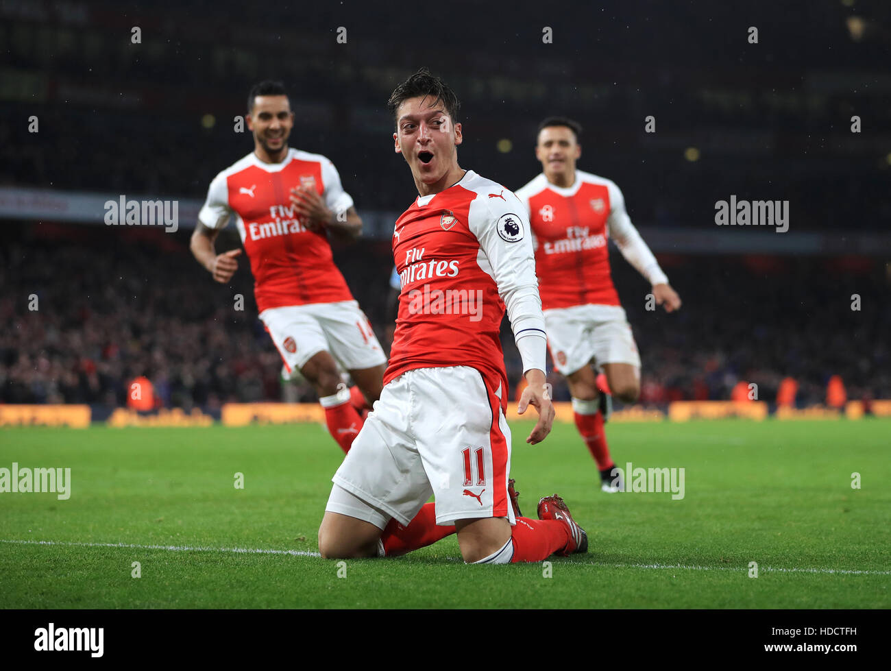 Arsenal's Mesut Ozil celebrates scoring his side's second goal during ...