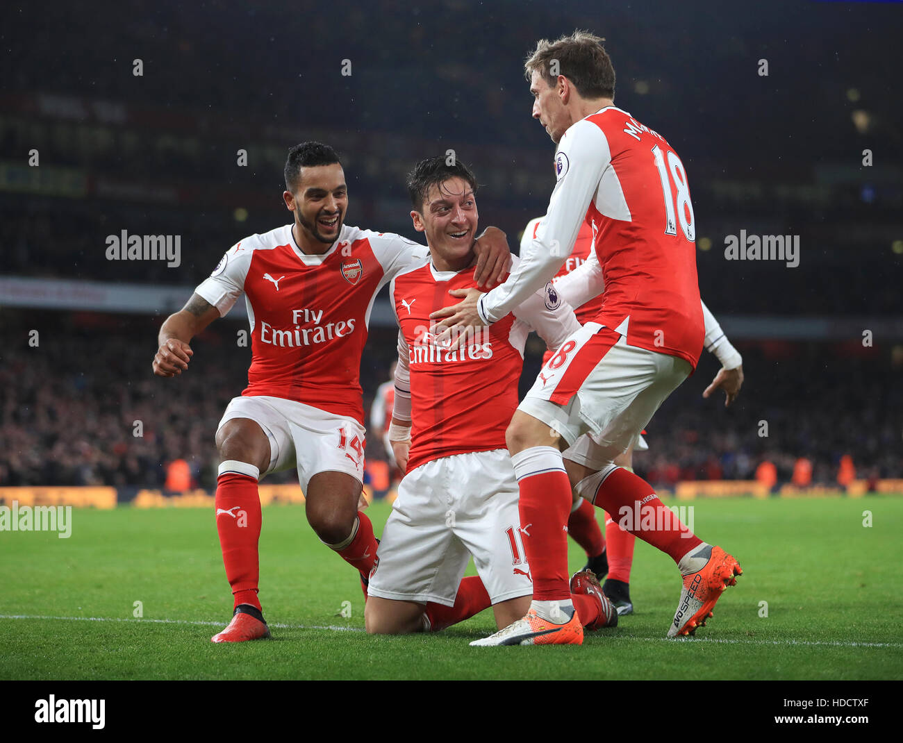 Arsenal's Mesut Ozil celebrates scoring his side's second goal during ...