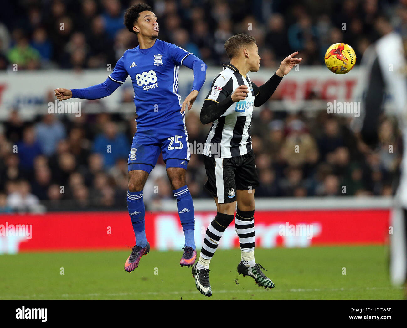 Birmingham City's Josh Dacres-Cogley (left) battles for the ball with ...