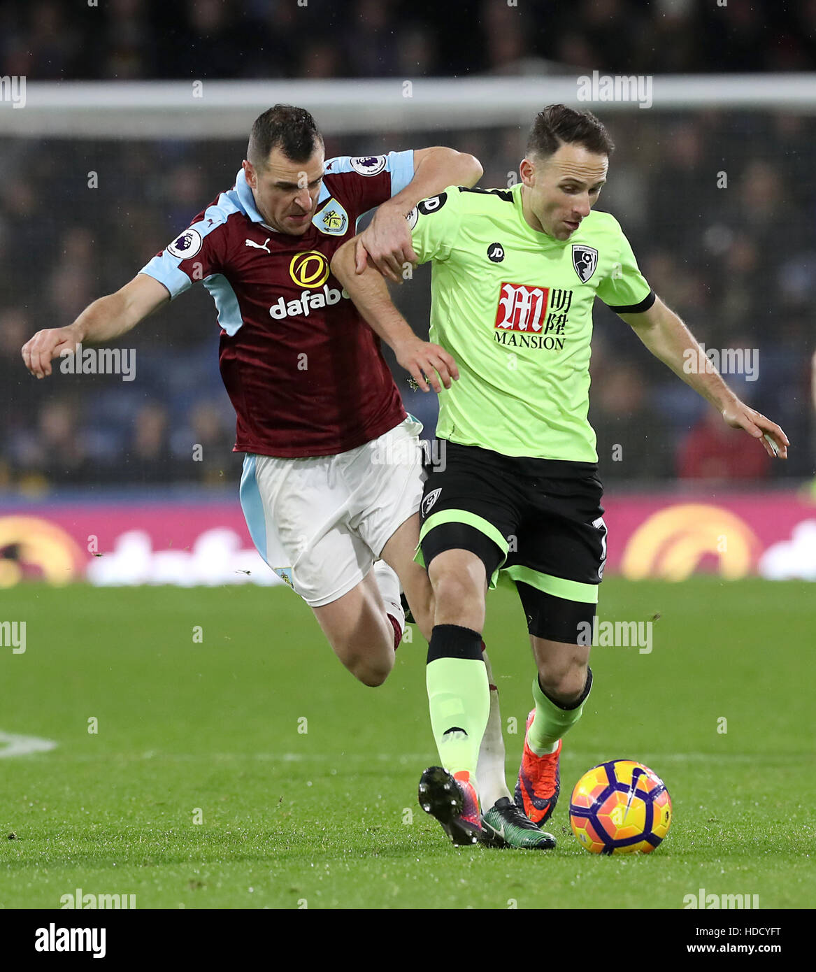 Burnley's Dean Marney (left) and AFC Bournemouth's Marc Pugh battle for ...