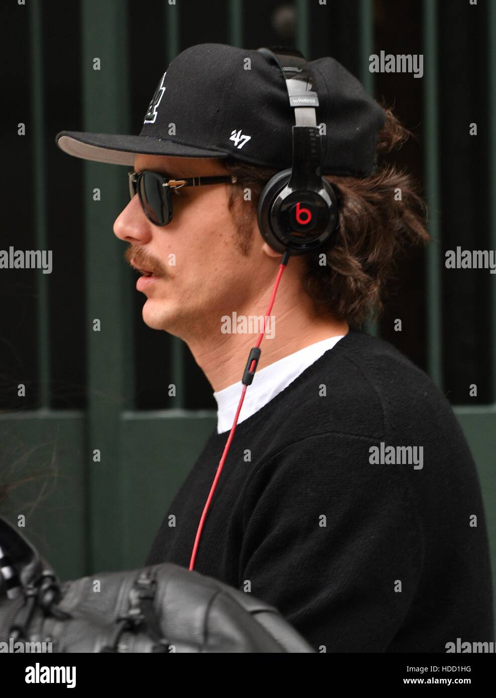 James Franco sports Coach's REXY sweater in Soho Featuring: James ...