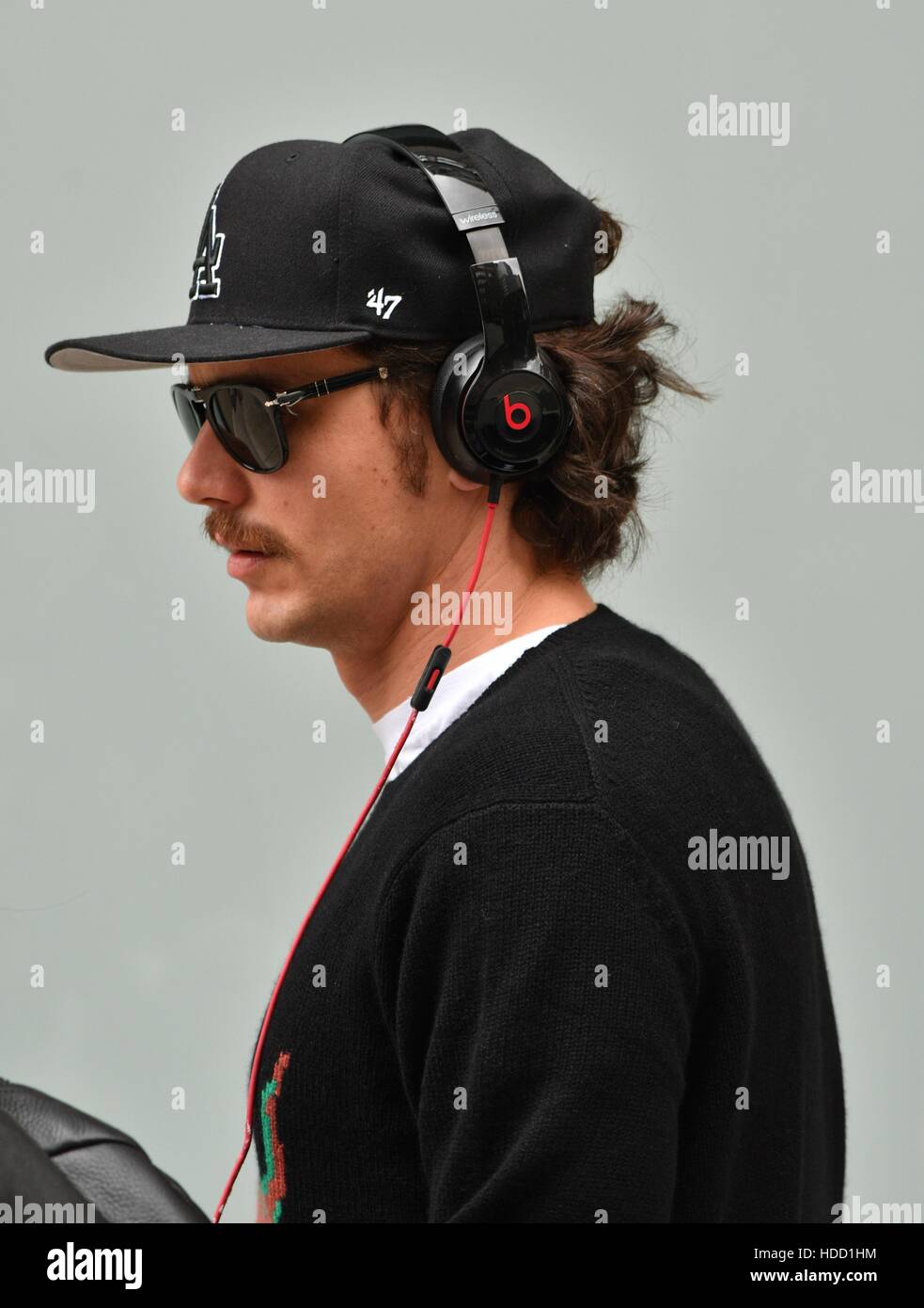 James Franco sports Coach's REXY sweater in Soho Featuring: James ...