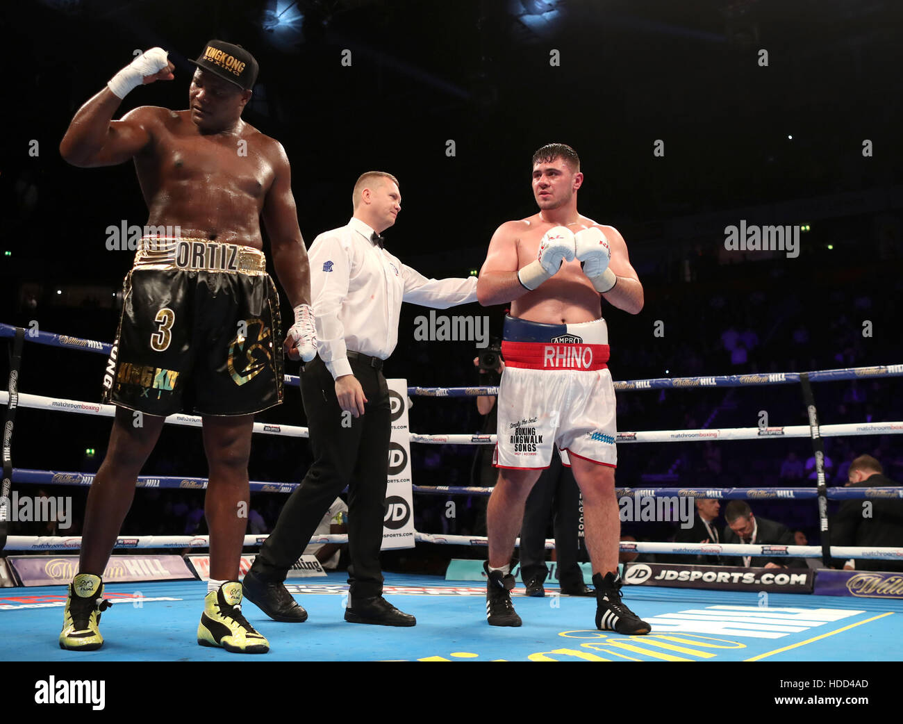 Luiz Ortiz (left) celebrates beating David Allen during their ...