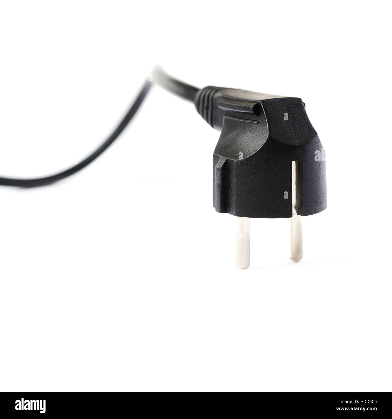 Black electric computer power supply cable isolated over white ...