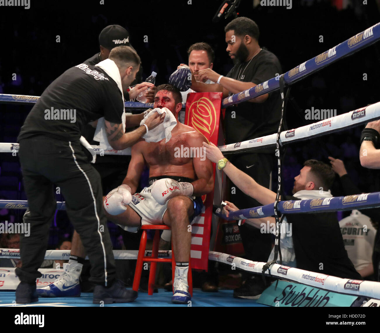 Frank Buglioni is tended to by his corner team during his British Light ...