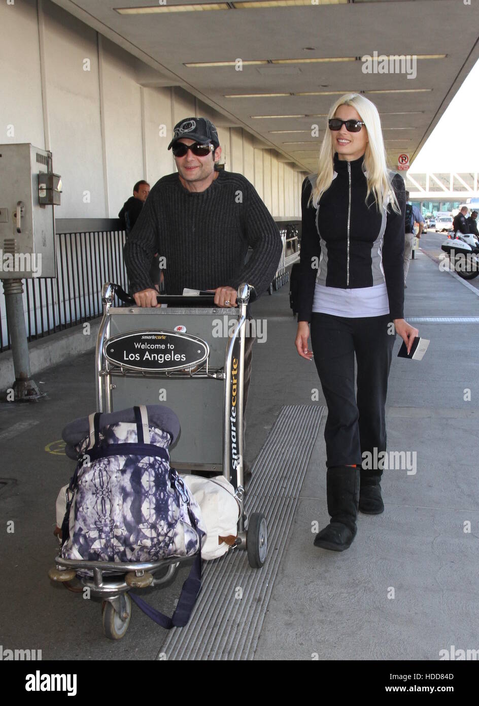 Corey Feldman at Los Angeles International Airport (LAX) with a female ...