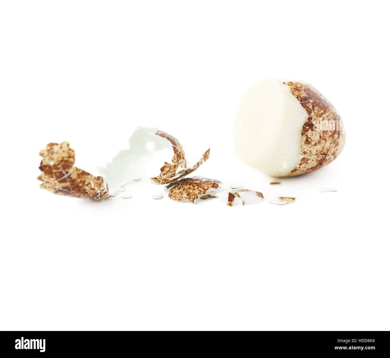 Single peeled quail egg isolated over white background Stock Photo - Alamy