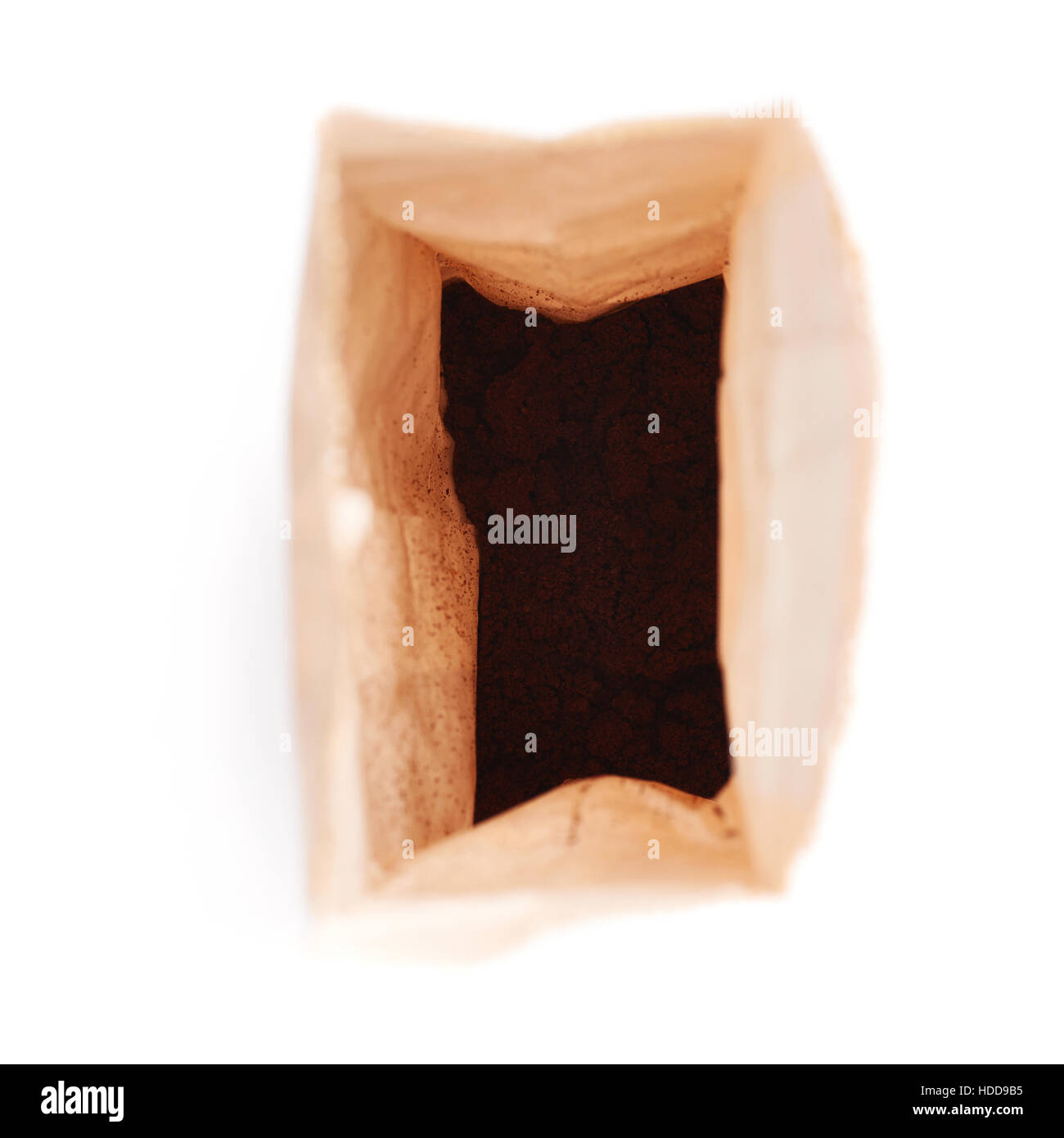 Craft brown paper pack full of ground coffee isolated over white ...