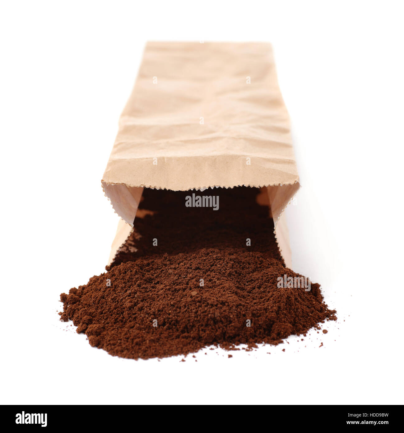 Craft brown paper pack full of ground coffee isolated over white ...