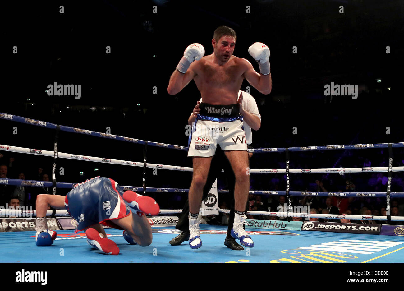 Frank Buglioni (right) celebrates beating Hosea Burton during their ...