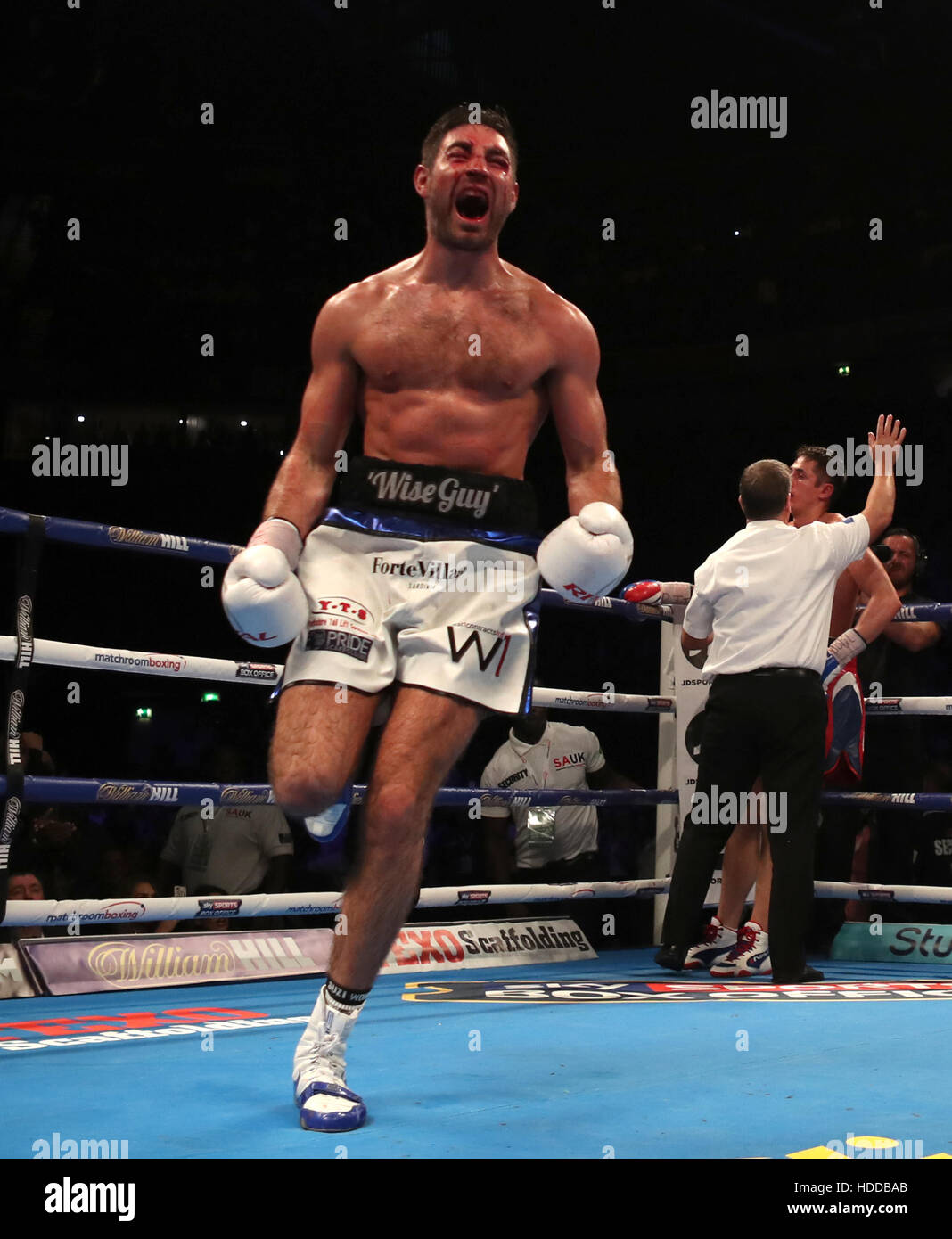 Frank Buglioni celebrates beating Hosea Burton during their British ...
