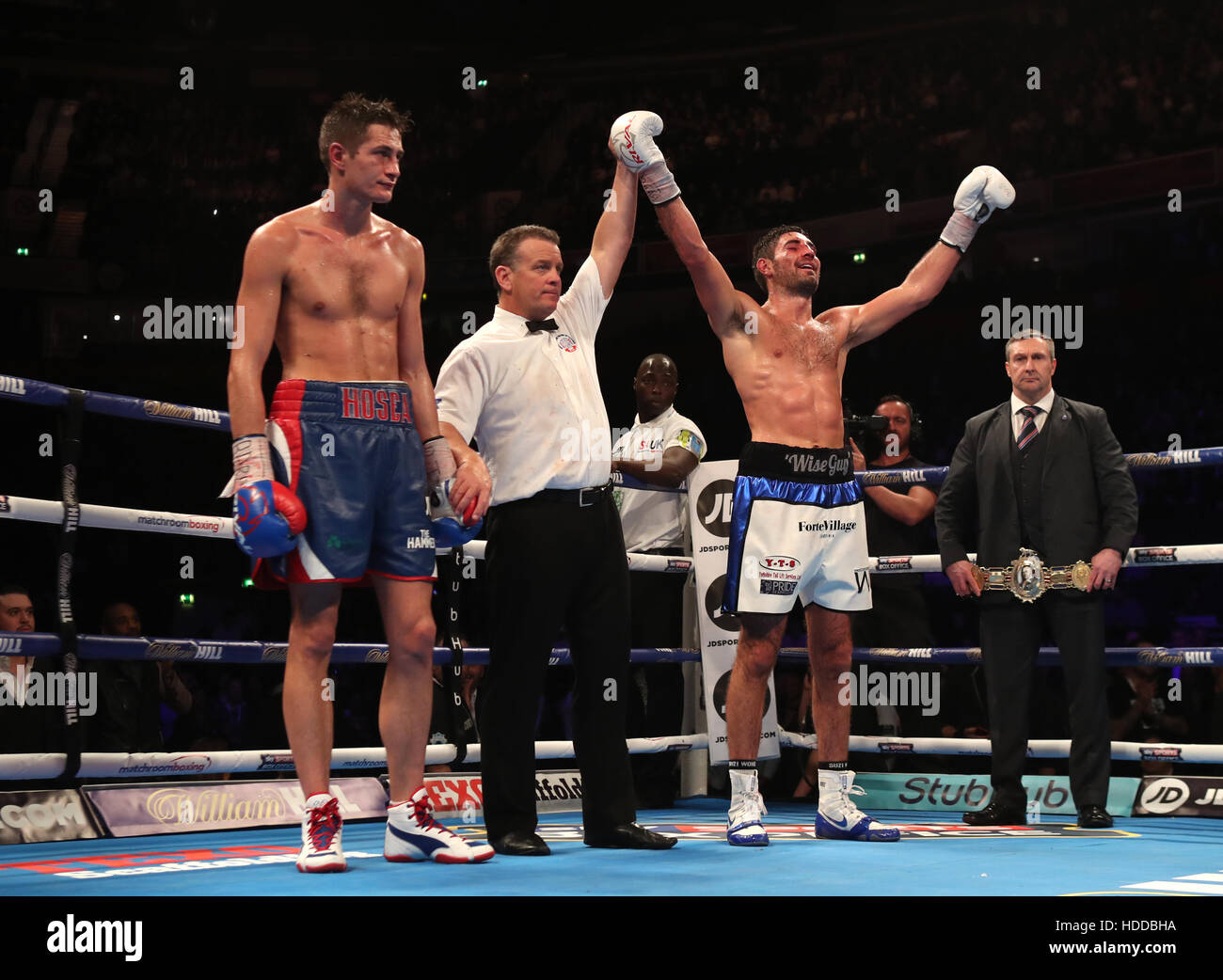 Frank Buglioni (right) celebrates beating Hosea Burton during their ...