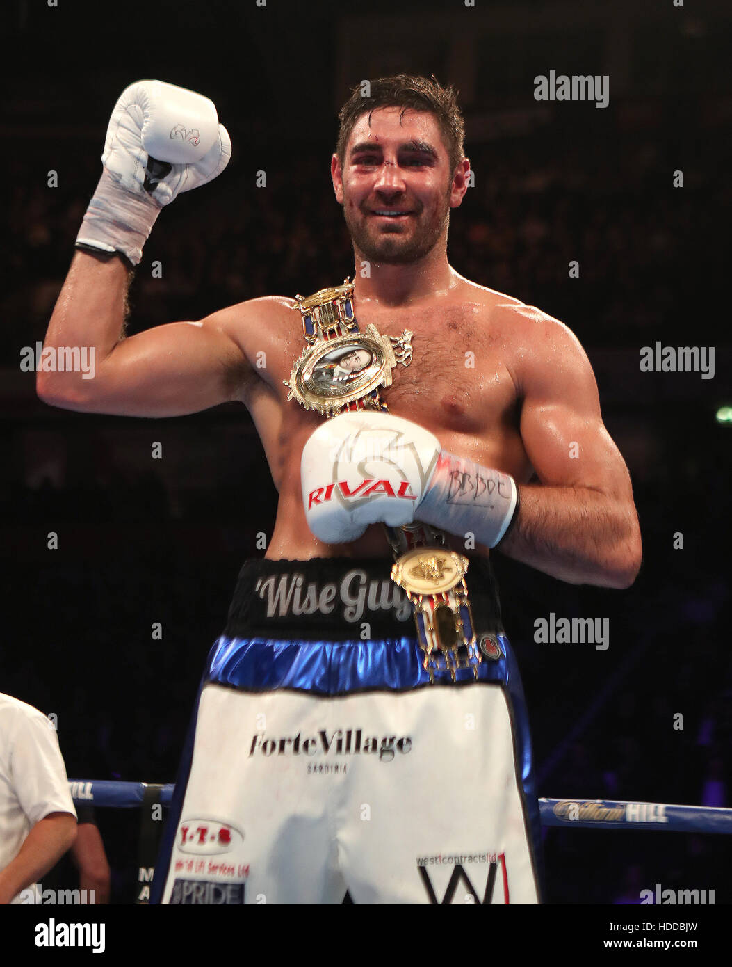 Frank Buglioni celebrates beating Hosea Burton during their British ...