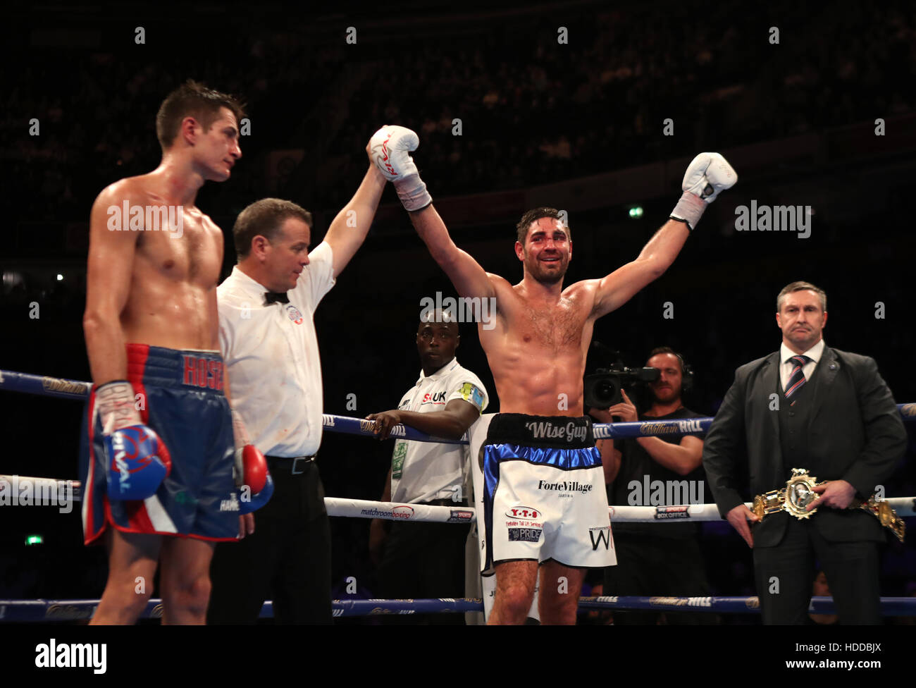 Frank Buglioni (right) celebrates beating Hosea Burton during their ...