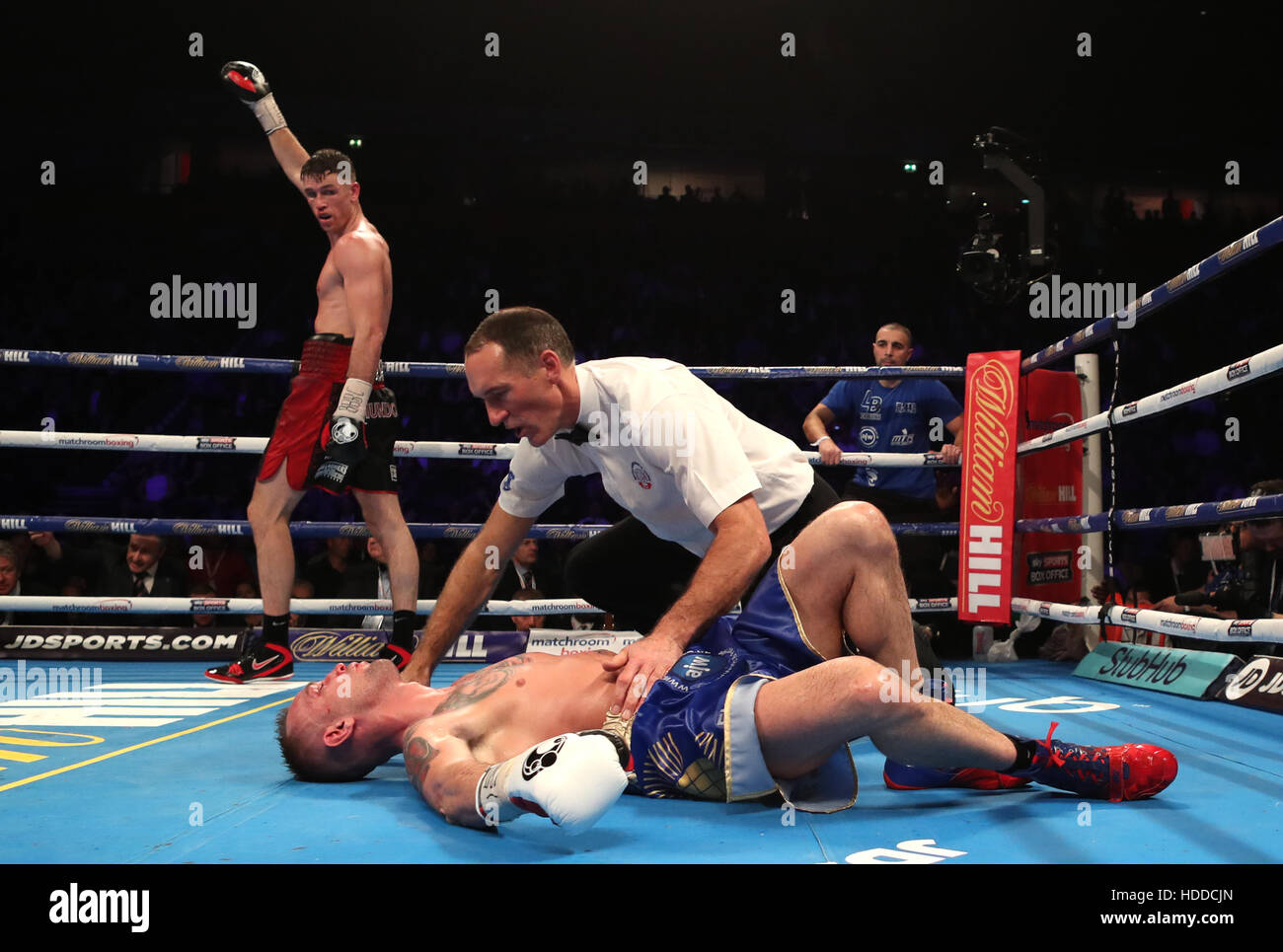 Luke Blackledge on the mat after being knocked down by Callum Smith ...