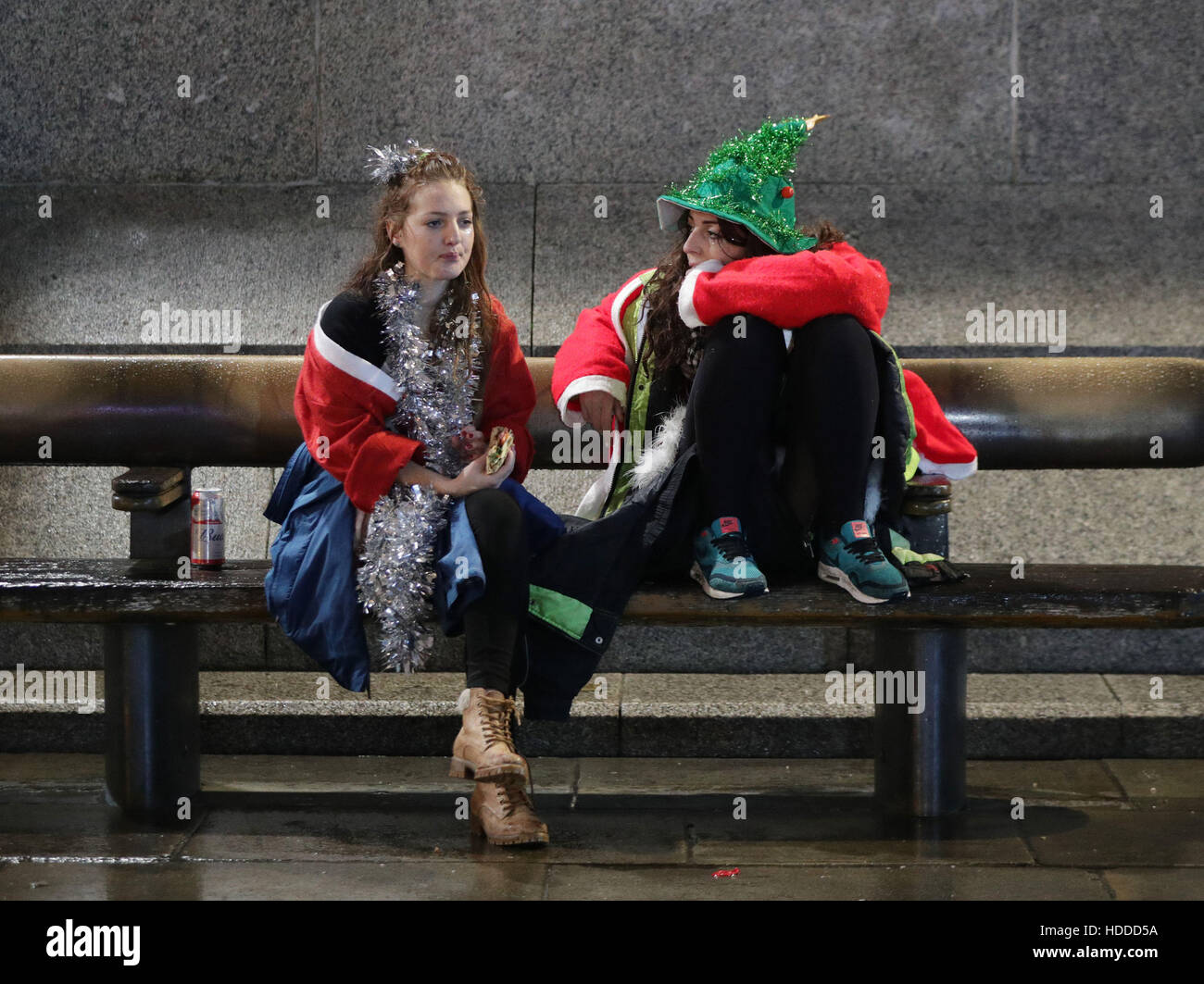Revellers in Trafalgar Square, London, taking part in the Santacon ...