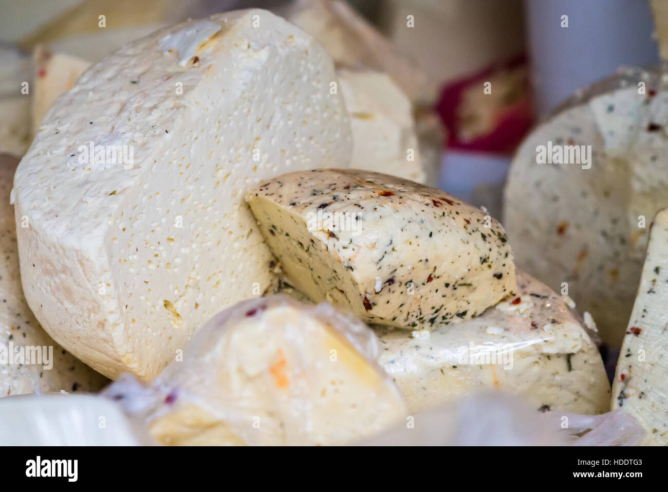 pieces of cheese with spices Stock Photo - Alamy