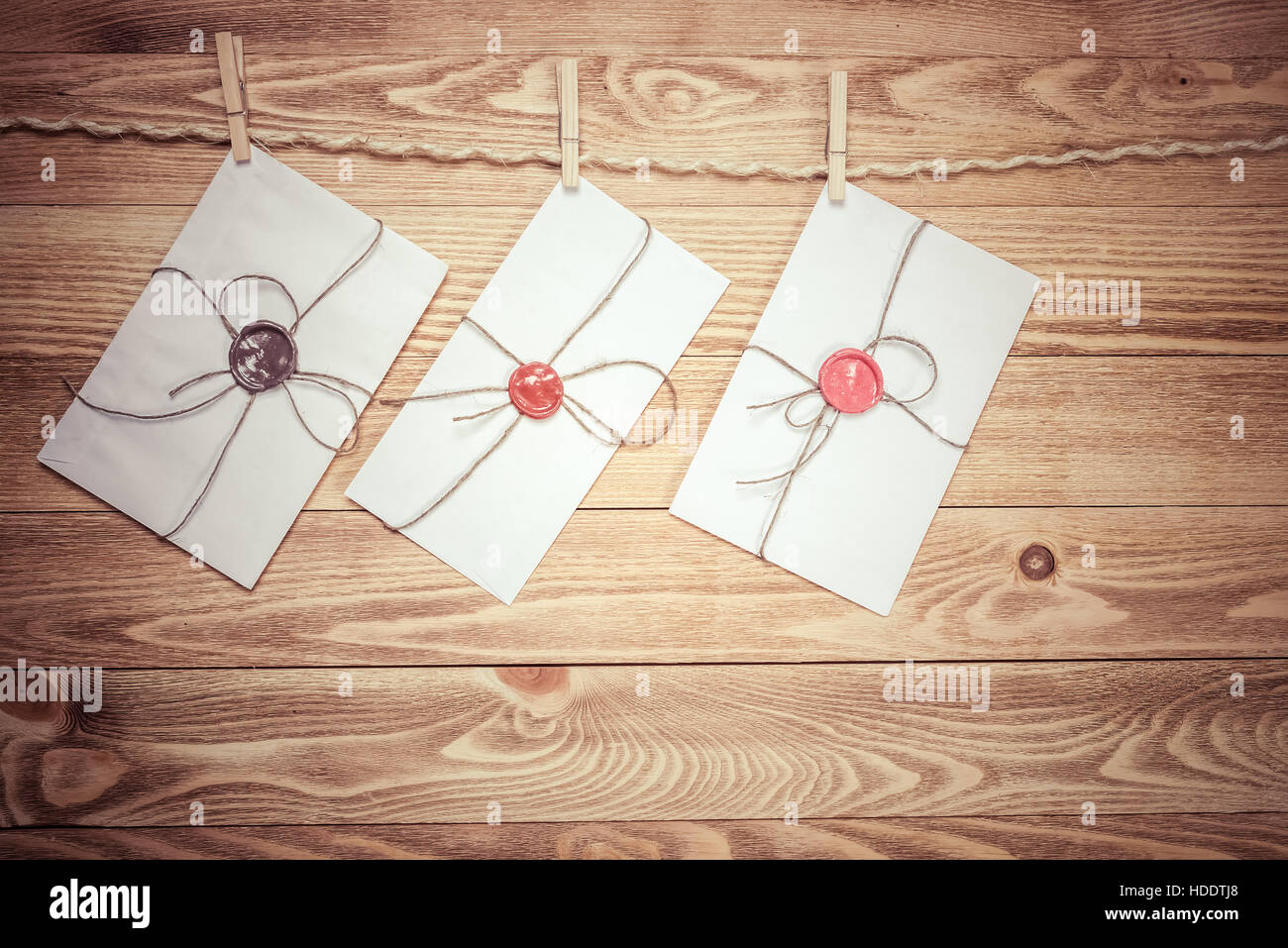 Mail envelope on rope Stock Photo - Alamy