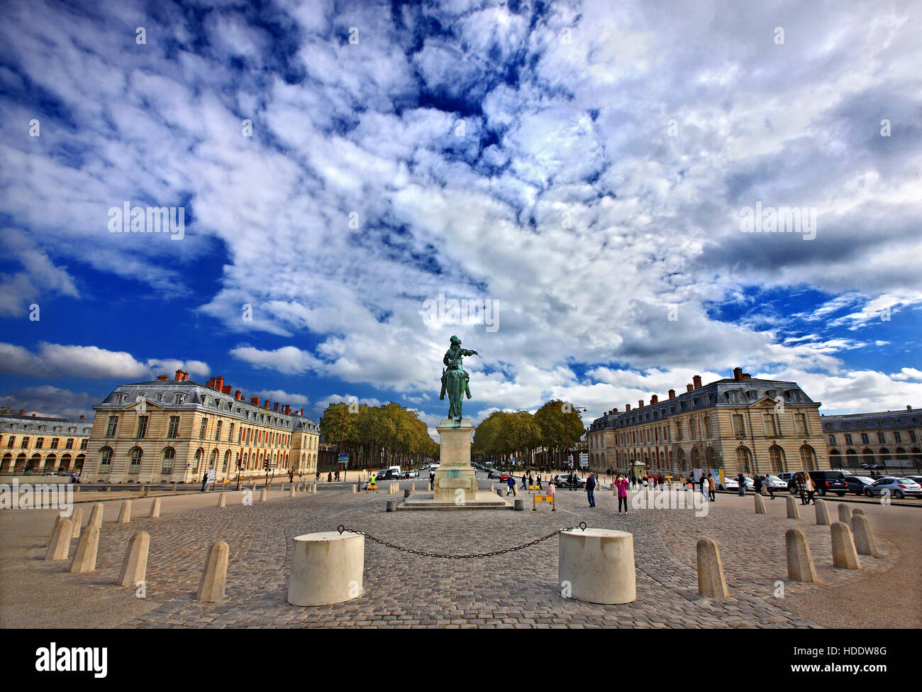 Statue of King Louis XIV (known as the "Sun King") outside the Palace ...