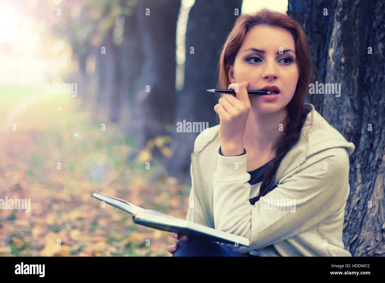 Pretty cute young girl walking in golden autumn park Stock Photo - Alamy Pretty cute young girl walking in golden autumn park Stock Photo - Alamy