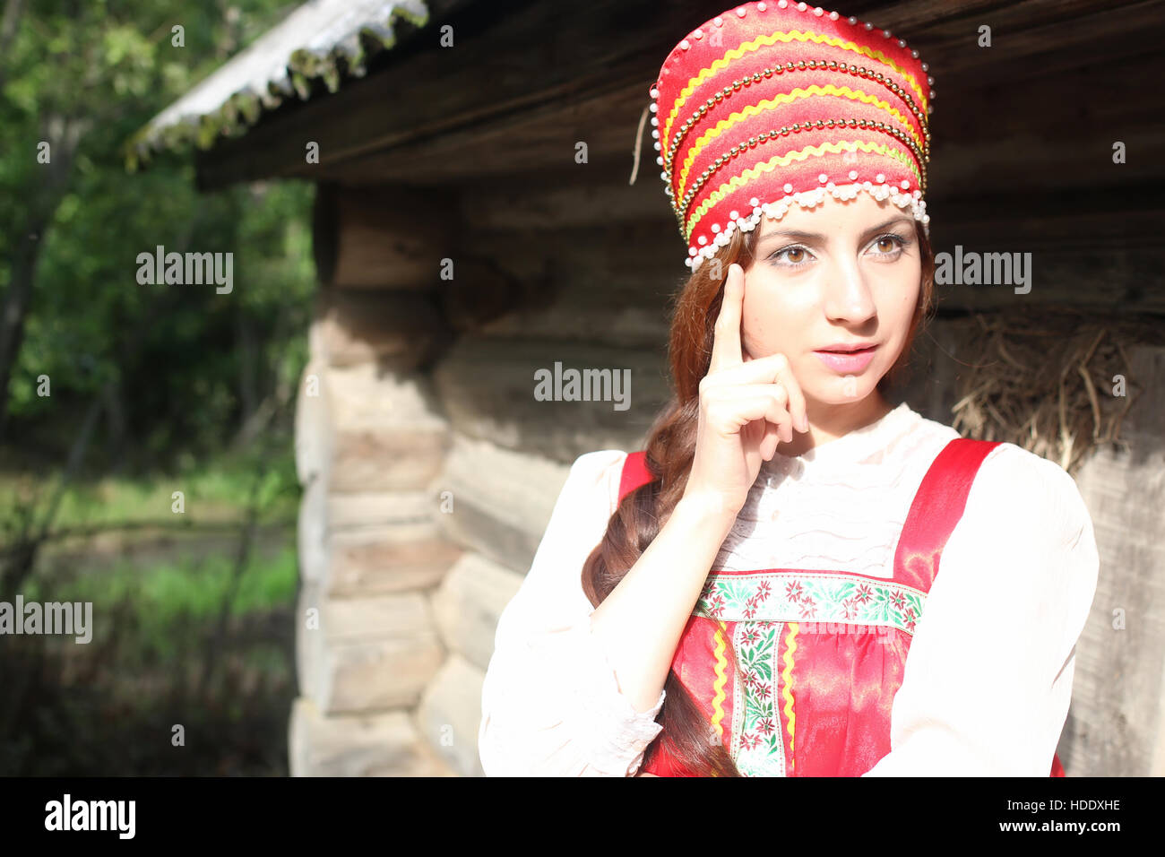 cute pretty girl in a traditional Slavic dress on nature in an unspoilt ...