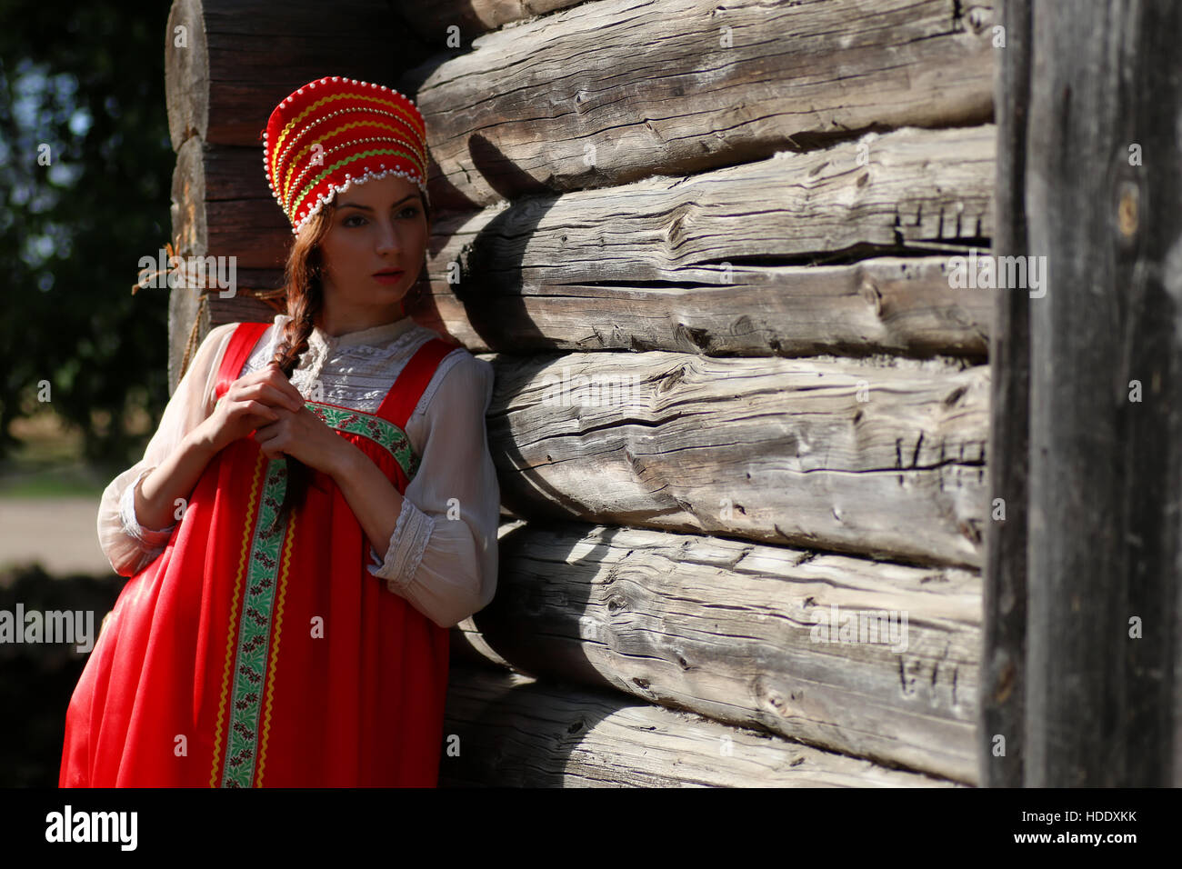 cute pretty girl in a traditional Slavic dress on nature in an unspoilt ...