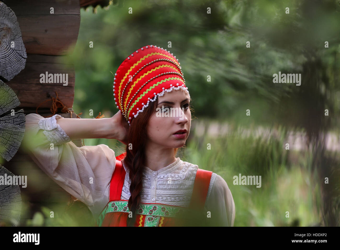 cute pretty girl in a traditional Slavic dress on nature in an unspoilt ...