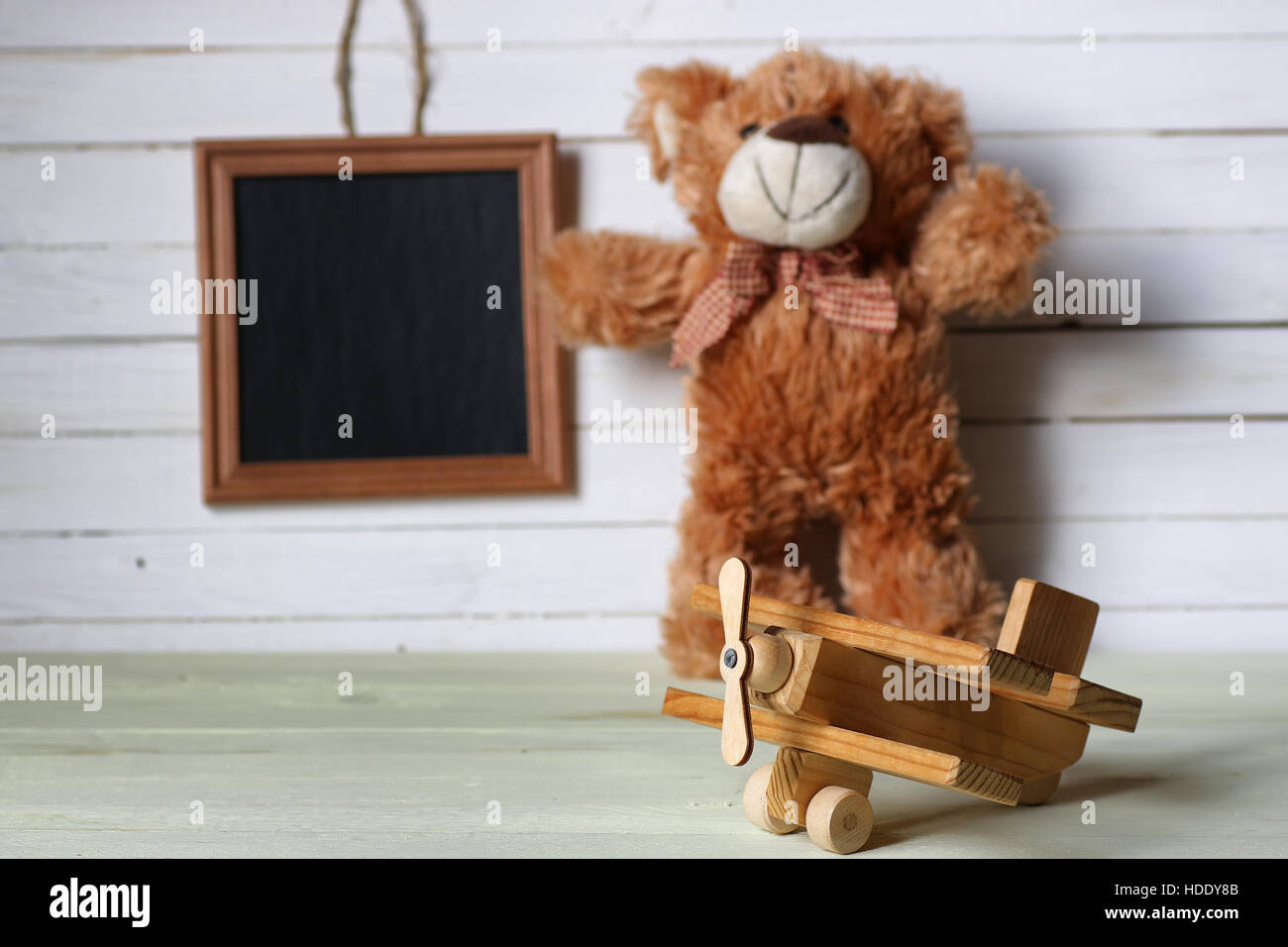 retro toy on wooden board place text Stock Photo - Alamy
