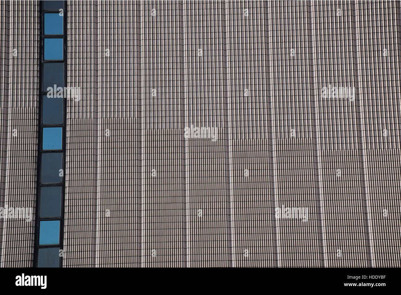 Vertical window lines on a textured wall Stock Photo - Alamy