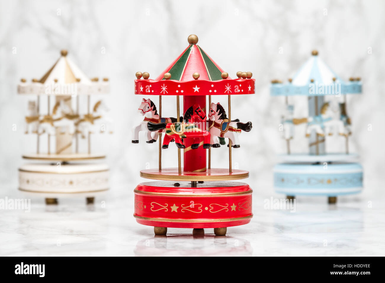 Wooden carousel horses with old vintage look on marble background Stock ...