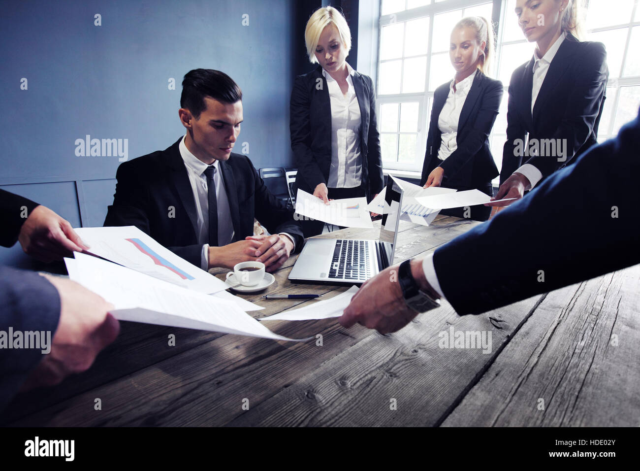 Business man getting extra work hi-res stock photography and images - Alamy