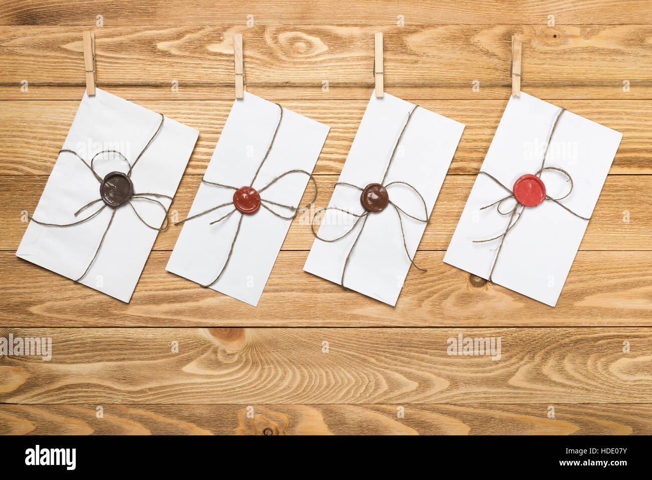 Mail envelope on rope Stock Photo - Alamy