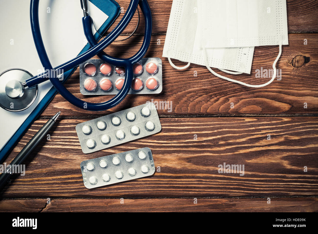 Desk of doctor with medicine things Stock Photo - Alamy